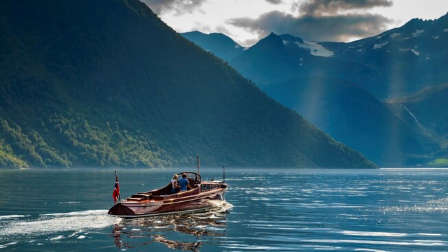 Private Alesund Scenic Cruise Aboard the Sylfiden | Port Adventures ...