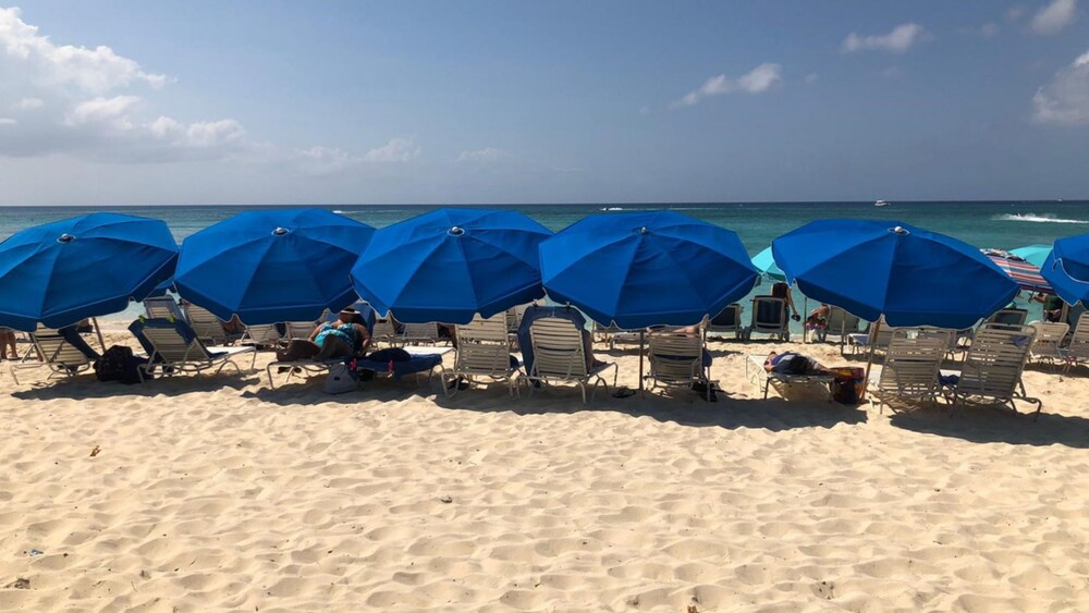 Family Beach Day at Seven Mile Beach | Port Adventures | Disney Cruise Line